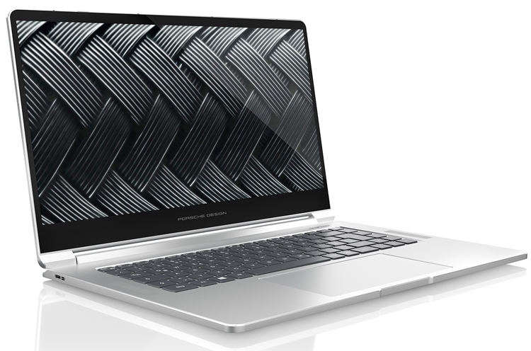 O laptop Porsche Design Ultra One com tela de 15,6 "pesa 1,5 kg ...